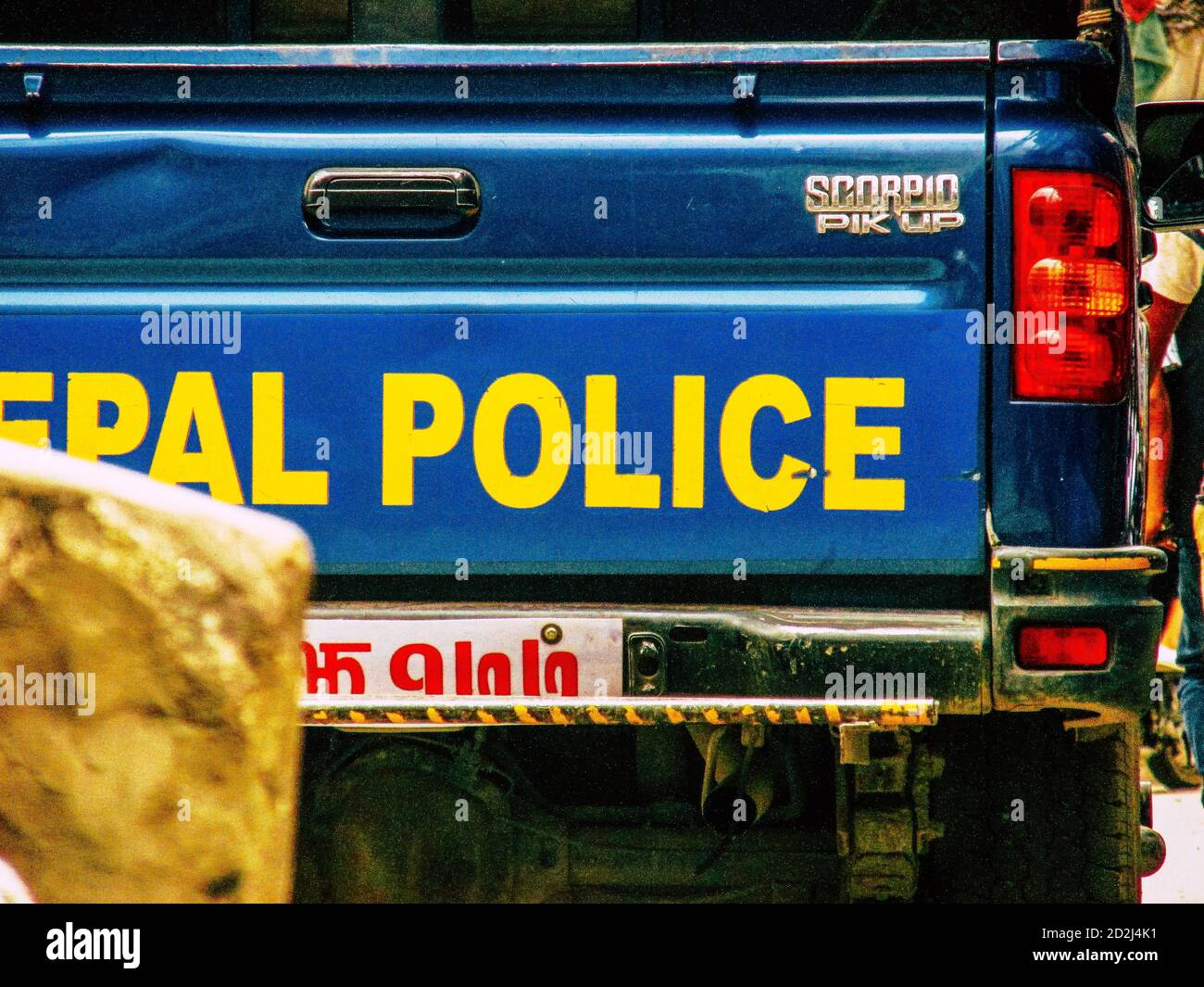 Closeup of an official police car patrolling the streets of the city ...