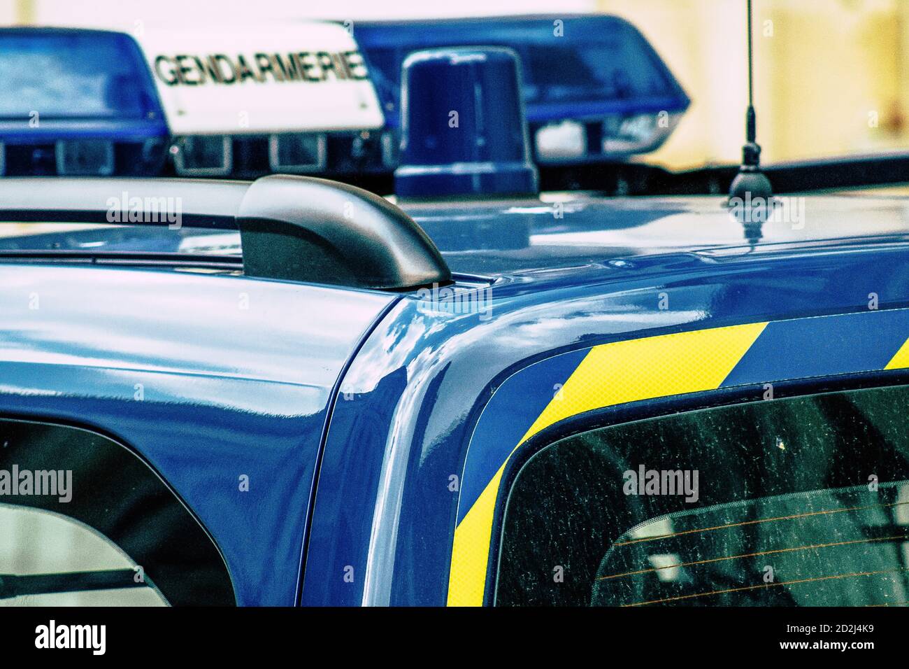 Closeup of an official police car patrolling the streets of the city ...