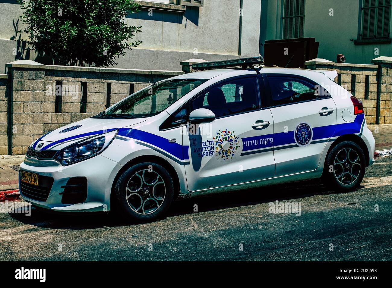 Closeup of an official police car patrolling the streets of the city ...