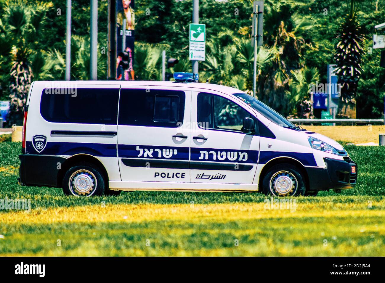 Closeup of an official police car patrolling the streets of the city ...