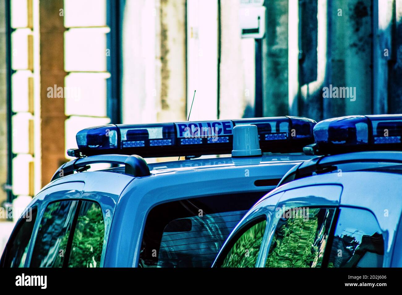 Closeup of an official police car patrolling the streets of the city ...