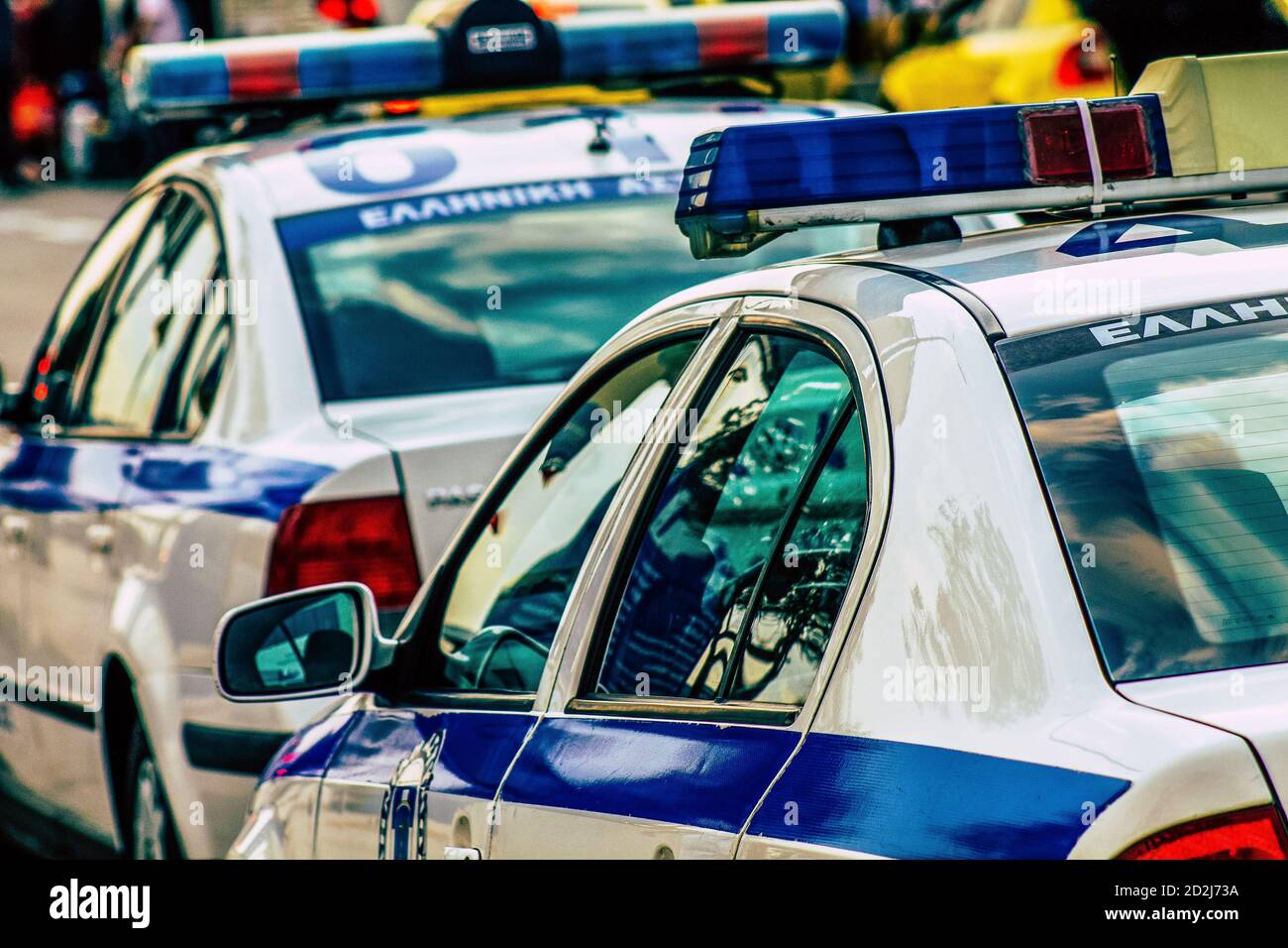 Closeup of an official police car patrolling the streets of the city ...