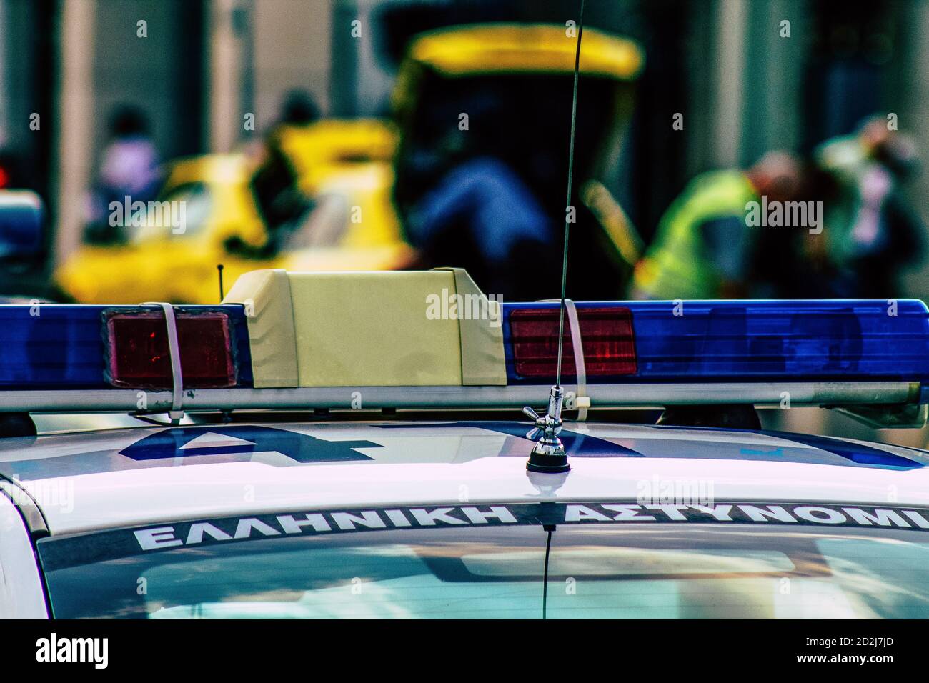 Closeup of an official police car patrolling the streets of the city ...
