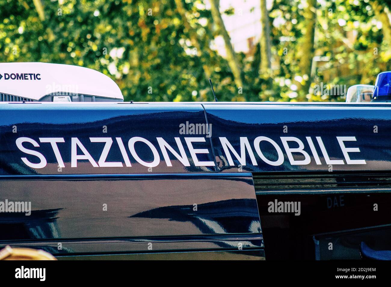 Closeup of an official police car patrolling the streets of the city ...