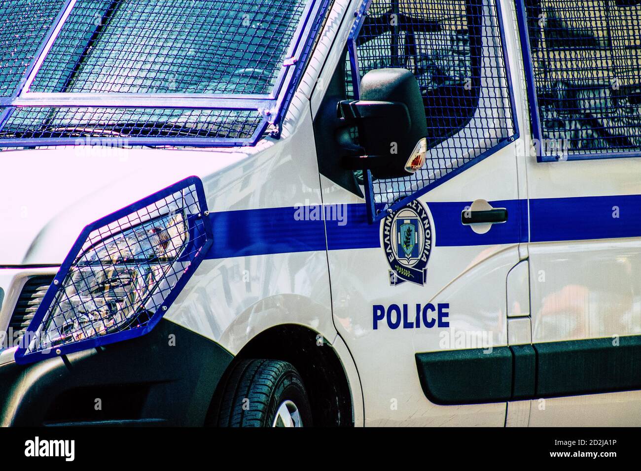 Closeup of an official police car patrolling the streets of the city ...