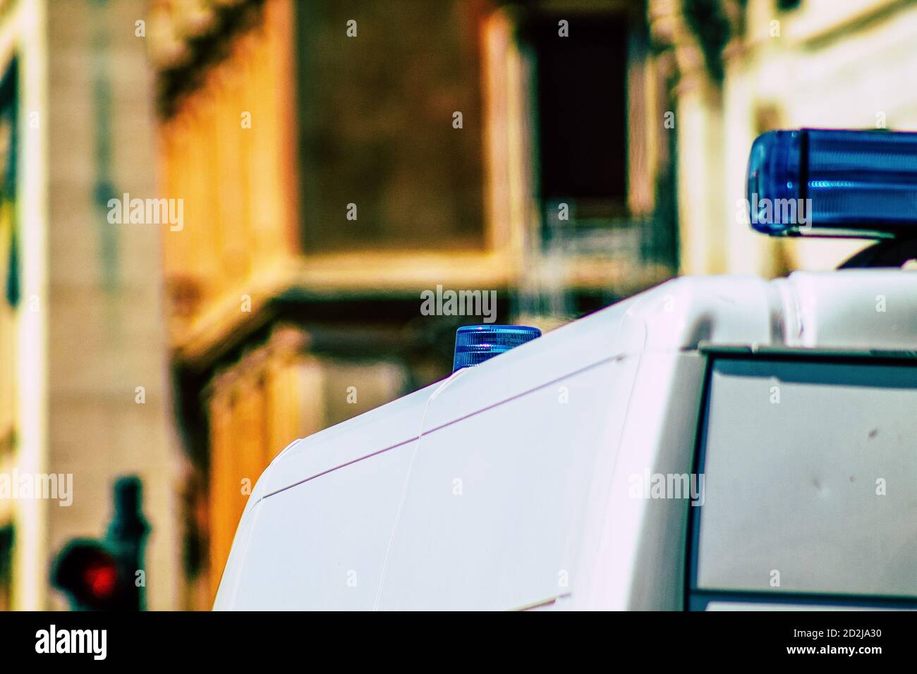 Closeup of an official police car patrolling the streets of the city ...