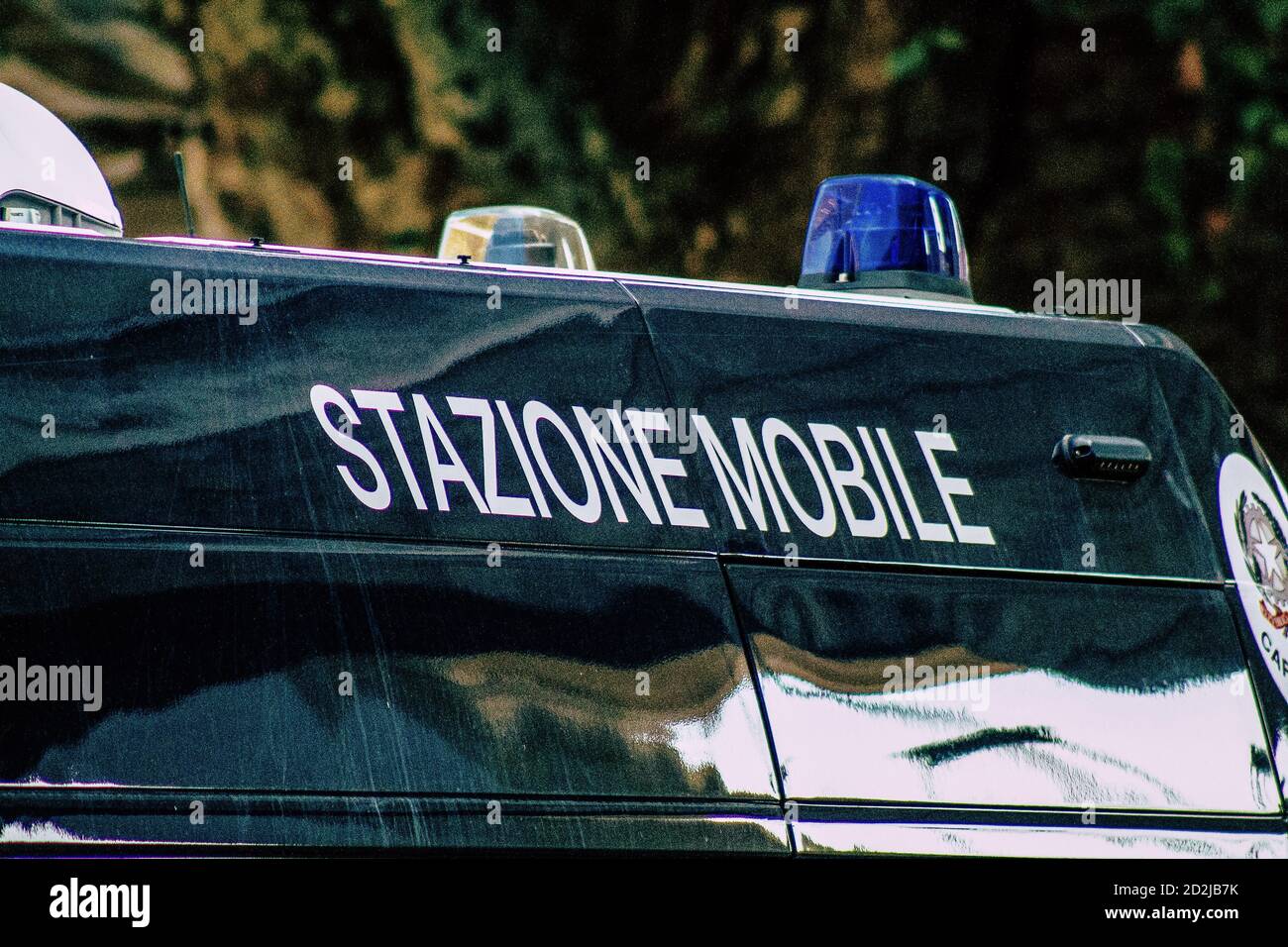 Closeup of an official police car patrolling the streets of the city ...