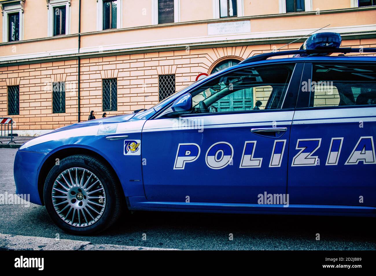 Closeup of an official police car patrolling the streets of the city ...