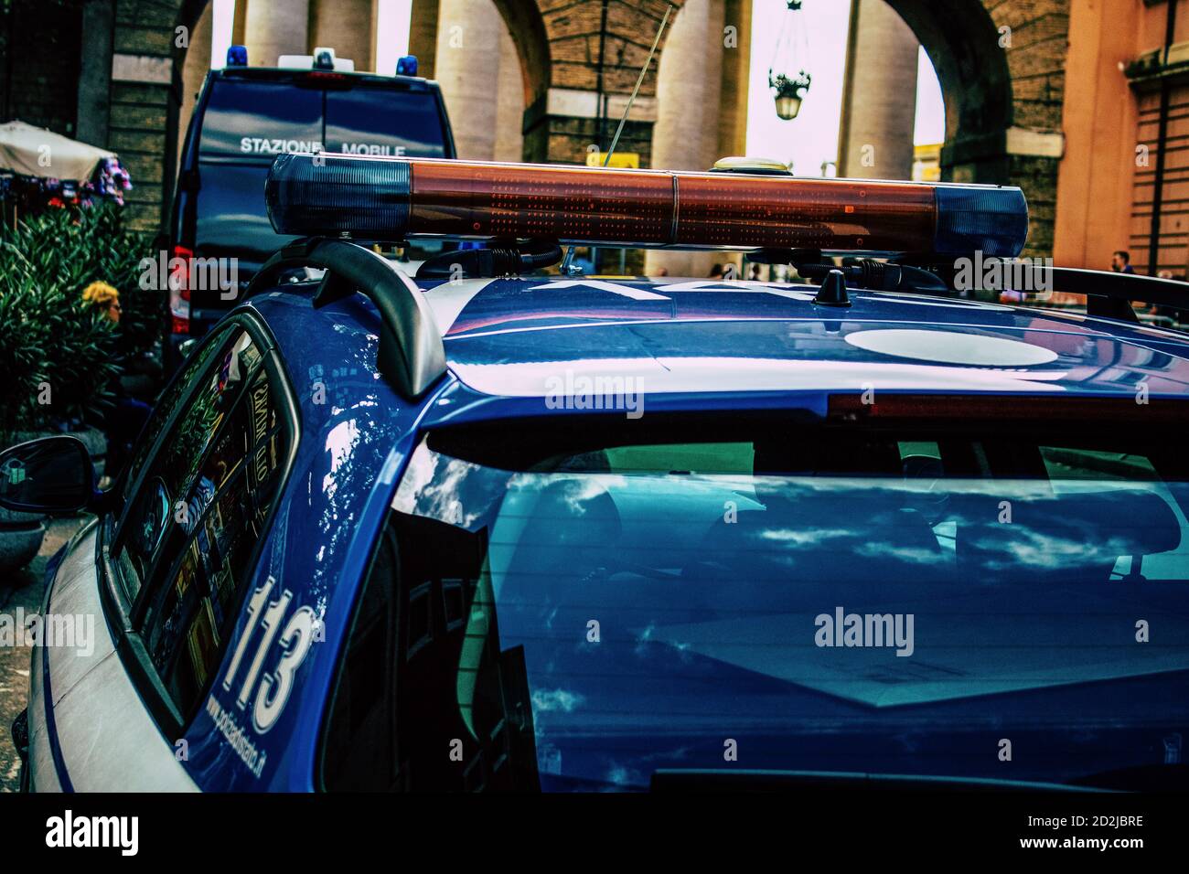 Closeup of an official police car patrolling the streets of the city center of the metropolitan ...