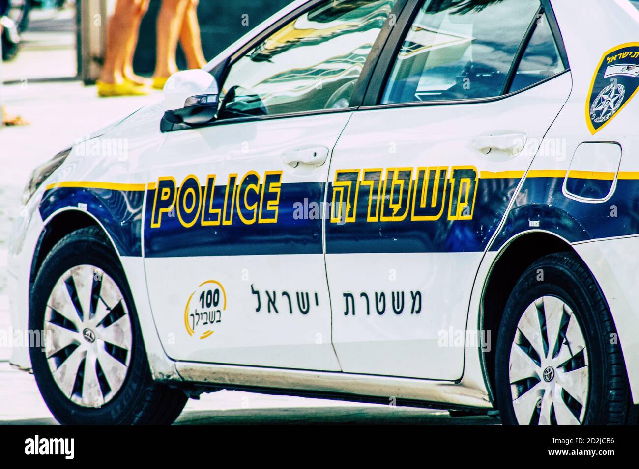 Closeup of an official police car patrolling the streets of the city ...