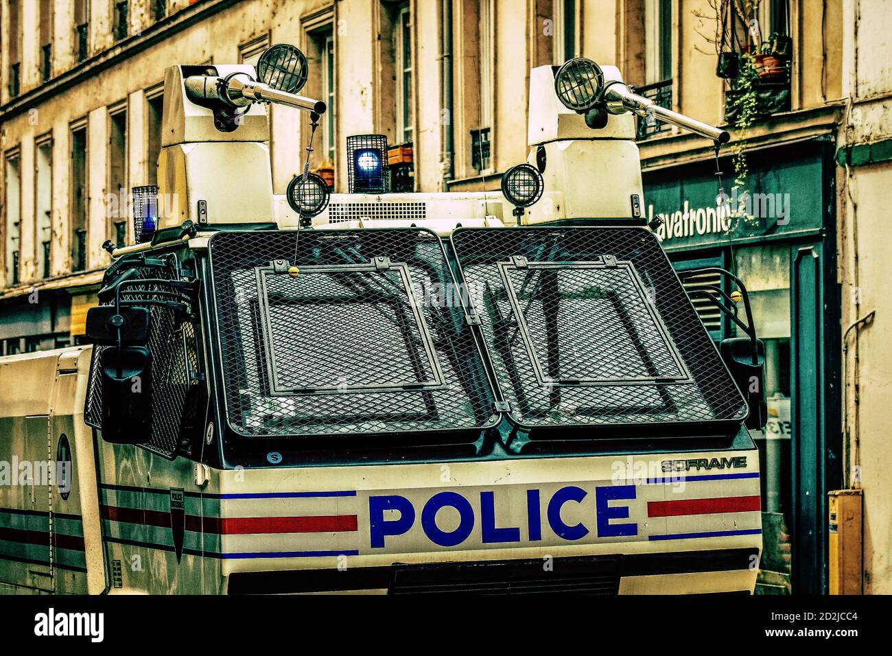 Closeup of an official police car patrolling the streets of the city ...