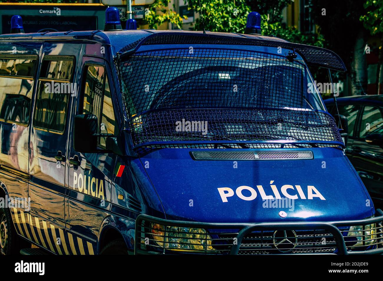 Closeup of an official police car patrolling the streets of the city ...