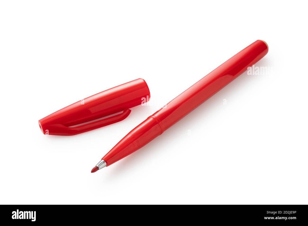 Red pen on white background Stock Photo - Alamy