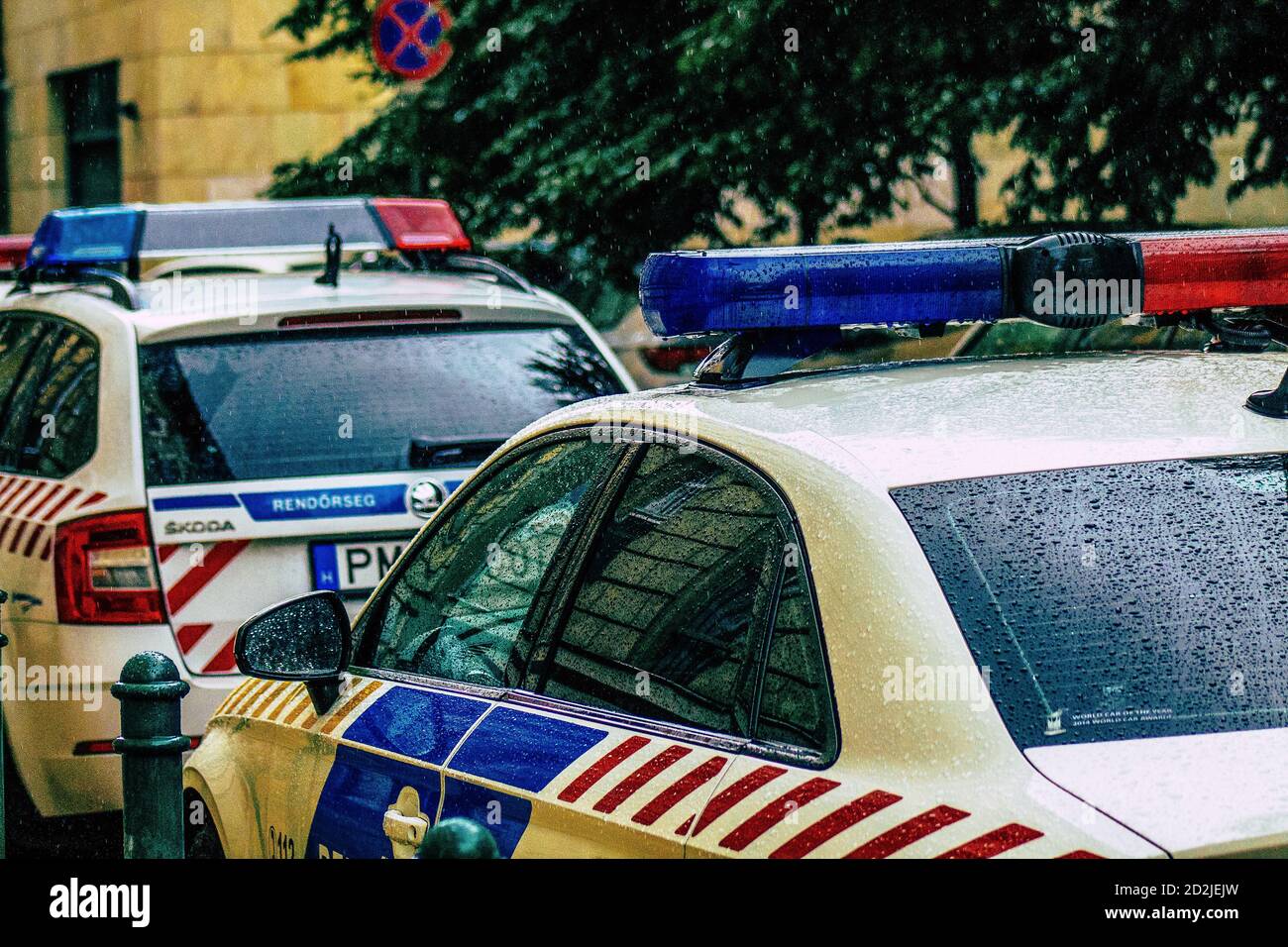 Closeup of an official police car patrolling the streets of the city ...