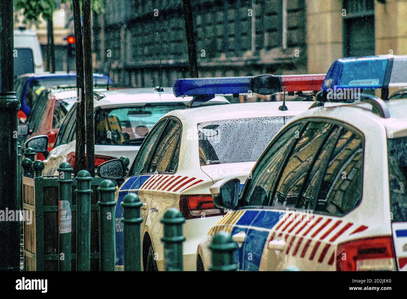 Closeup of an official police car patrolling the streets of the city ...