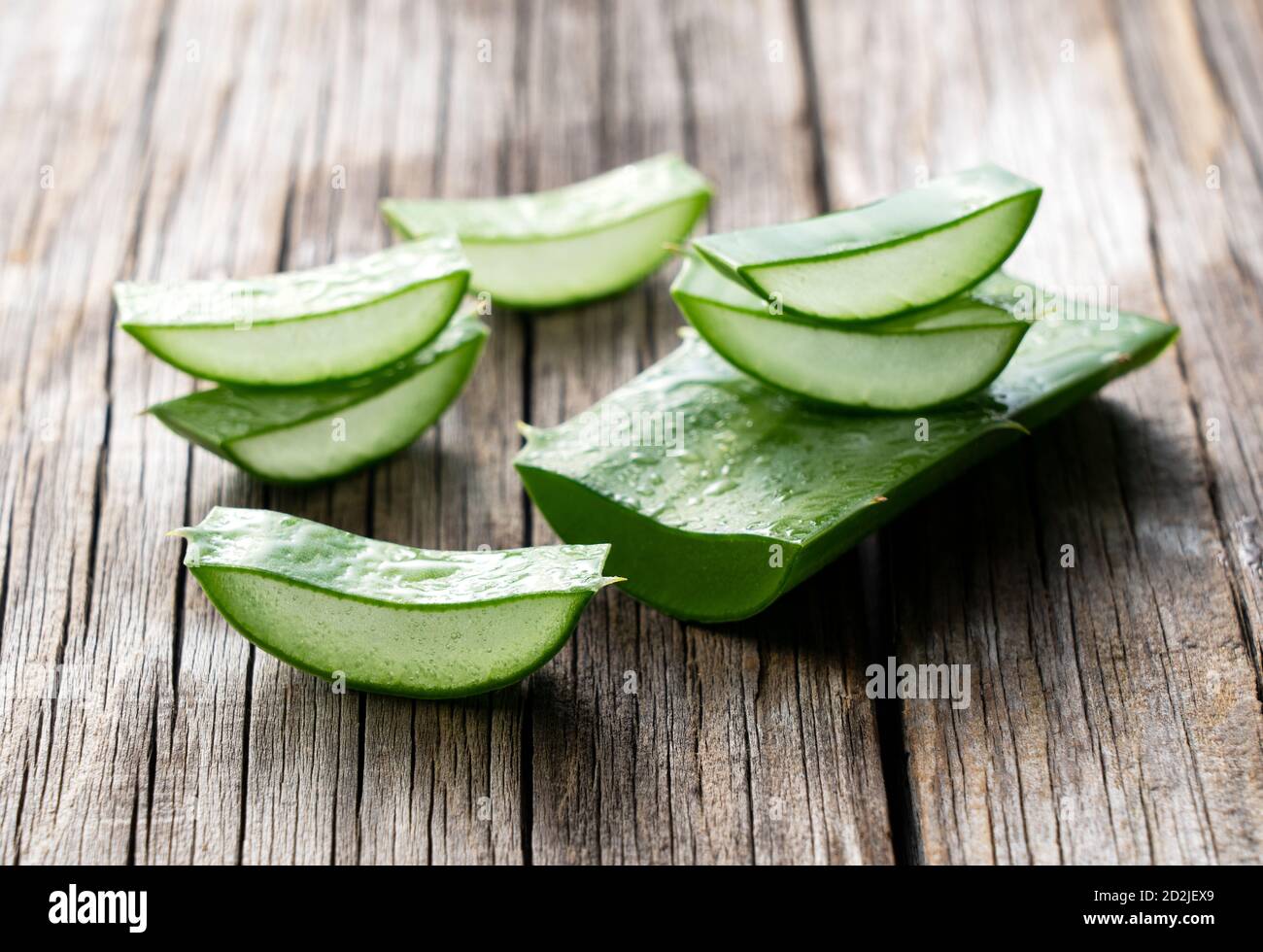 Cut aloe vera placed against the background of an old tree Stock Photo ...