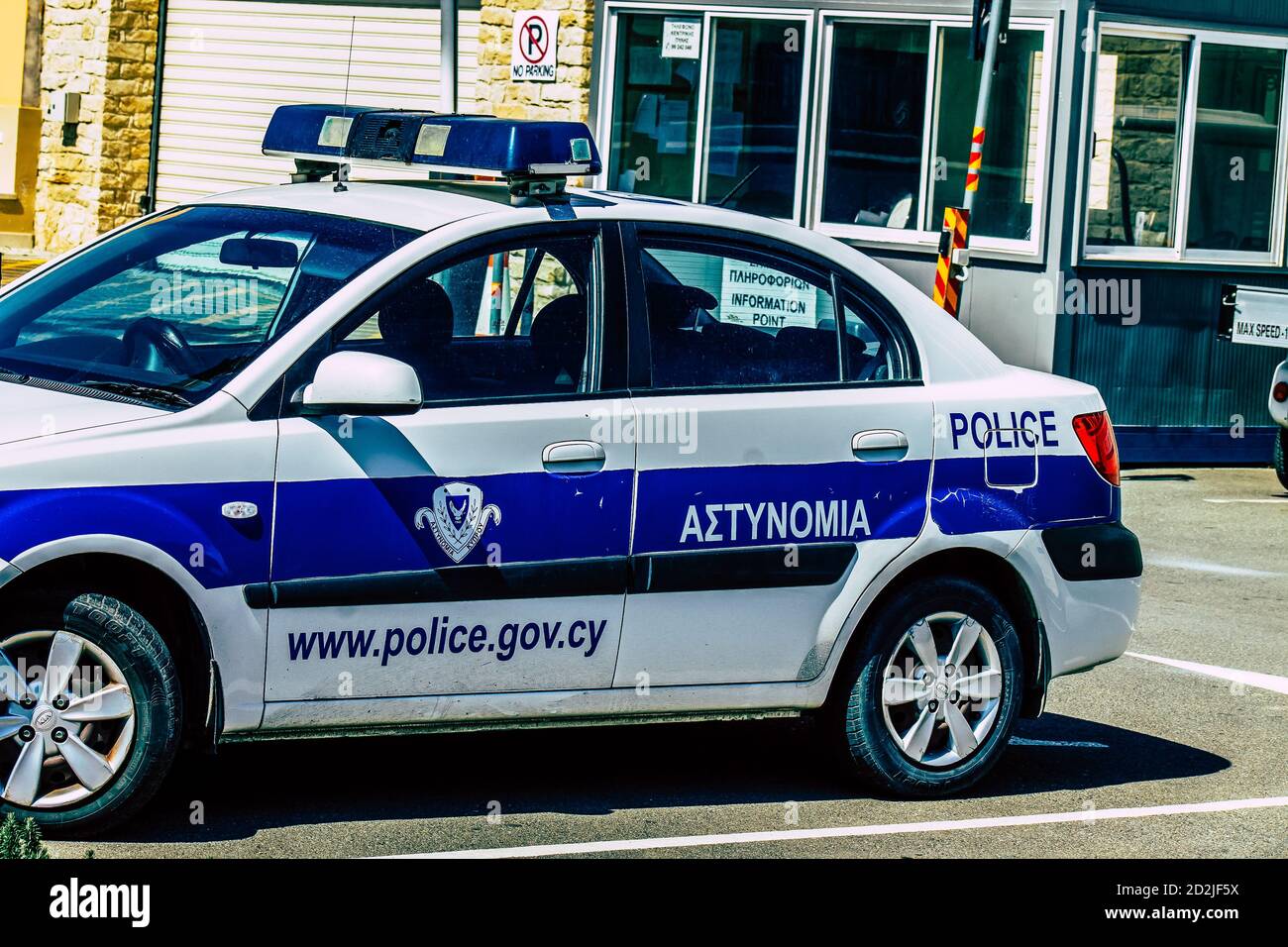 Closeup of an official police car patrolling the streets of the city ...