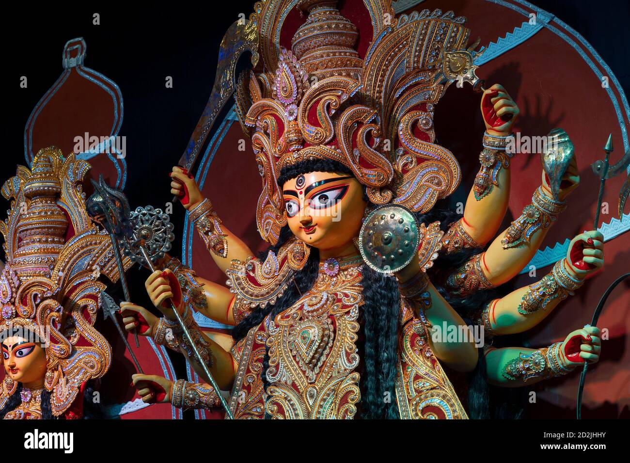 Decorated Goddess Durga idol , Durga Puja festival at night. Shot under ...