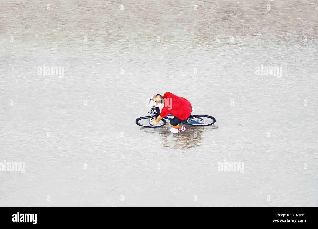 Top view on the man driving bicycle high speed Stock Photo - Alamy