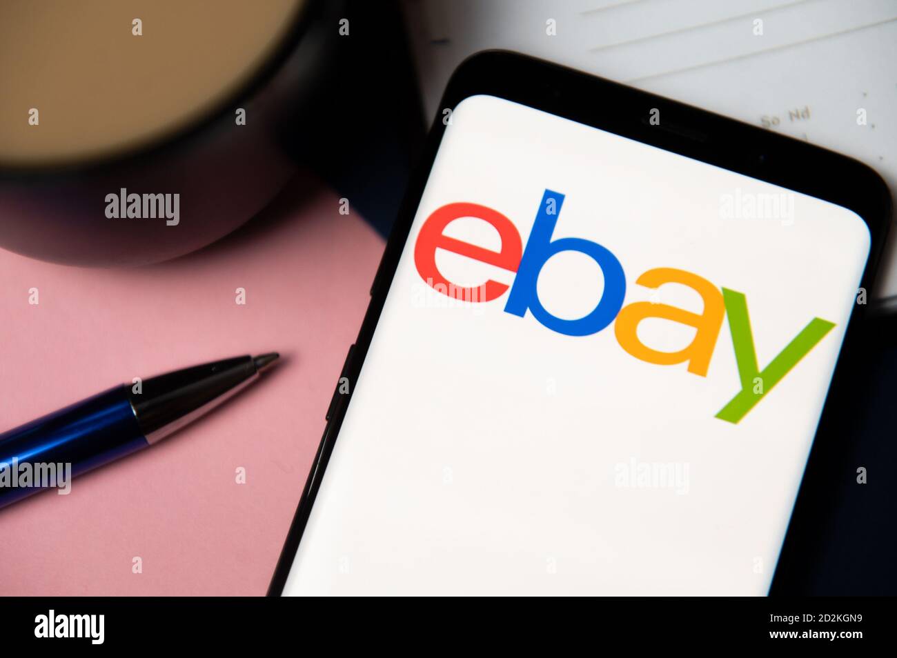 In this photo illustration a Ebay logo displayed on a smartphone Stock ...