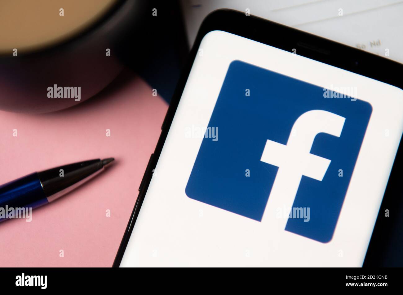 In this photo illustration a Facebook logo displayed on a smartphone ...