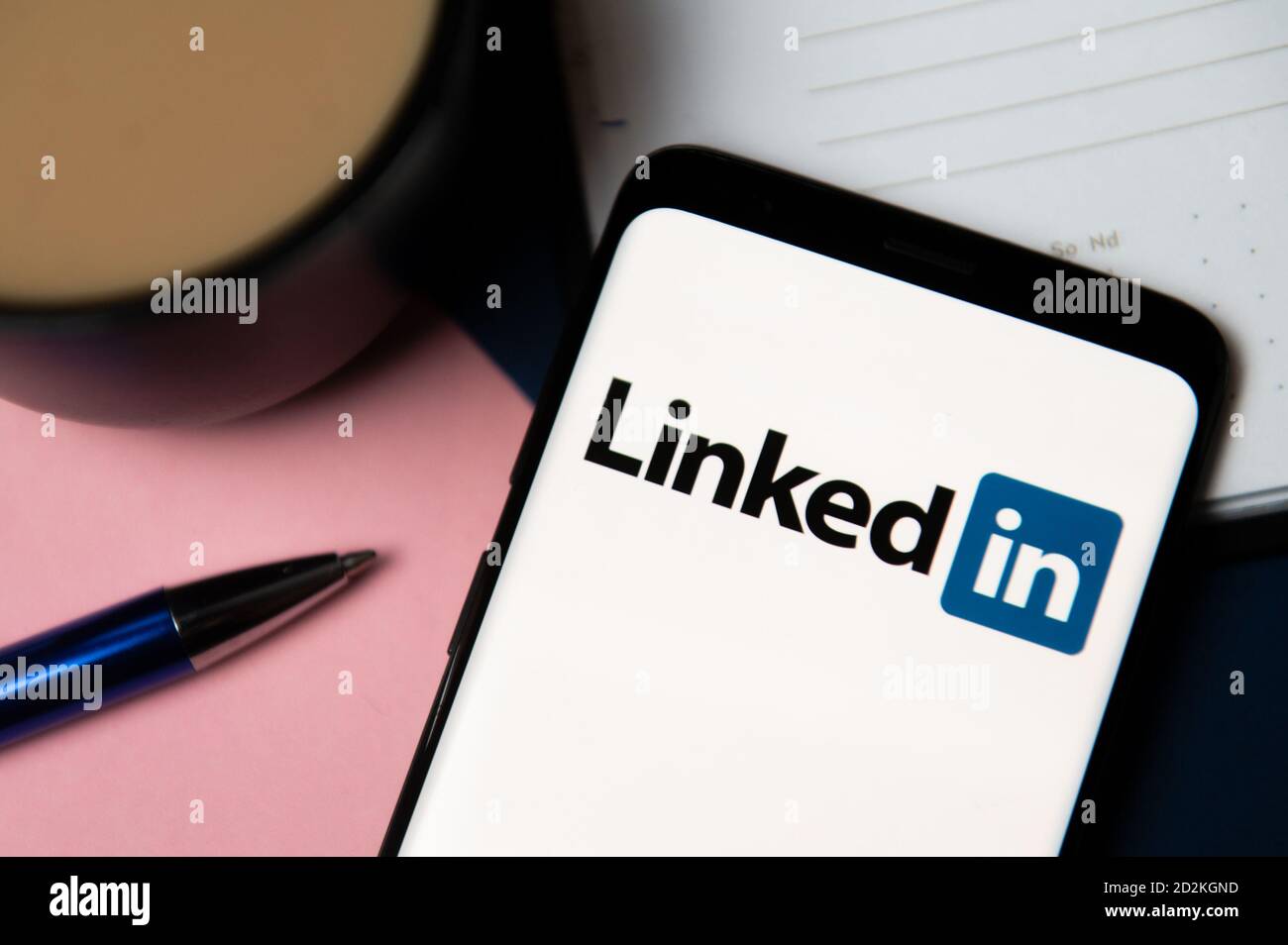 In this photo illustration a LinkedIn logo displayed on a smartphone ...