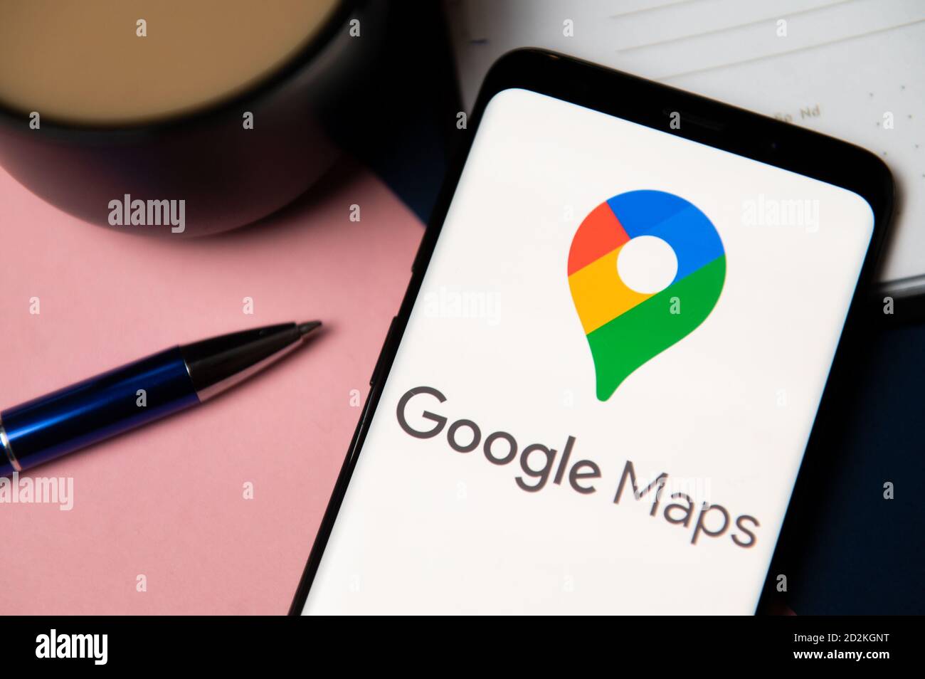 In this photo illustration the Google Maps logo displayed on a ...