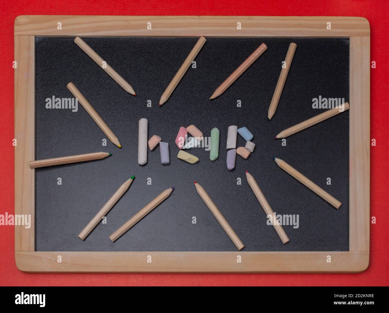 Help word written incoloured chalk on a black chalkboard Stock Photo ...