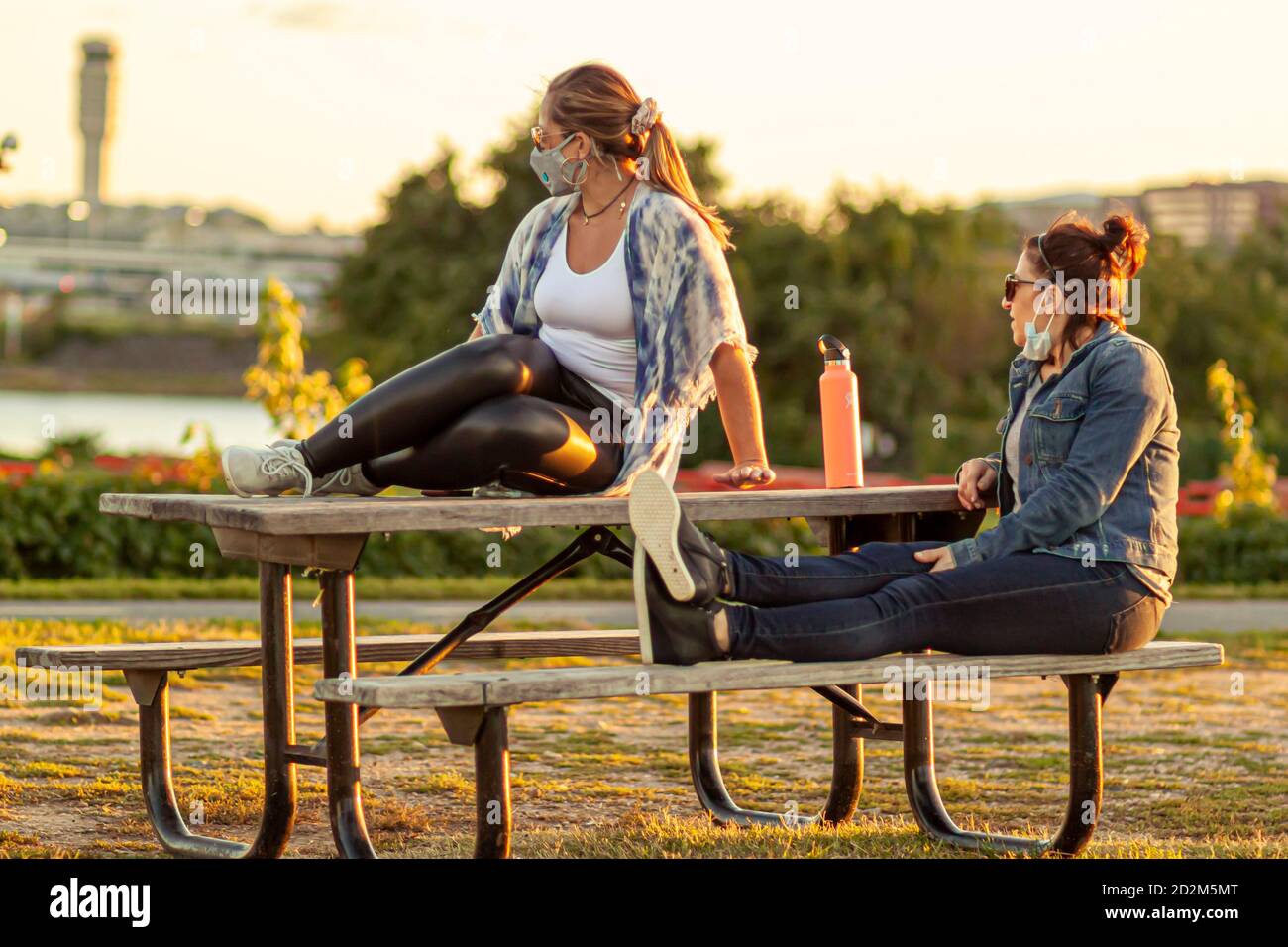 Arlington, VA, USA 10/02/2020: Two women are relaxing at Gravelly Point ...