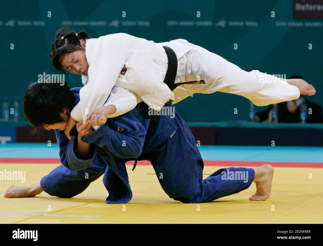 South Korea's Kim Young-ram (top) fights Japan's Misato Nakamura during ...