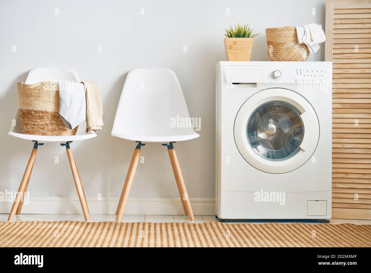 Interior of a real laundry room with a washing machine at home Stock ...