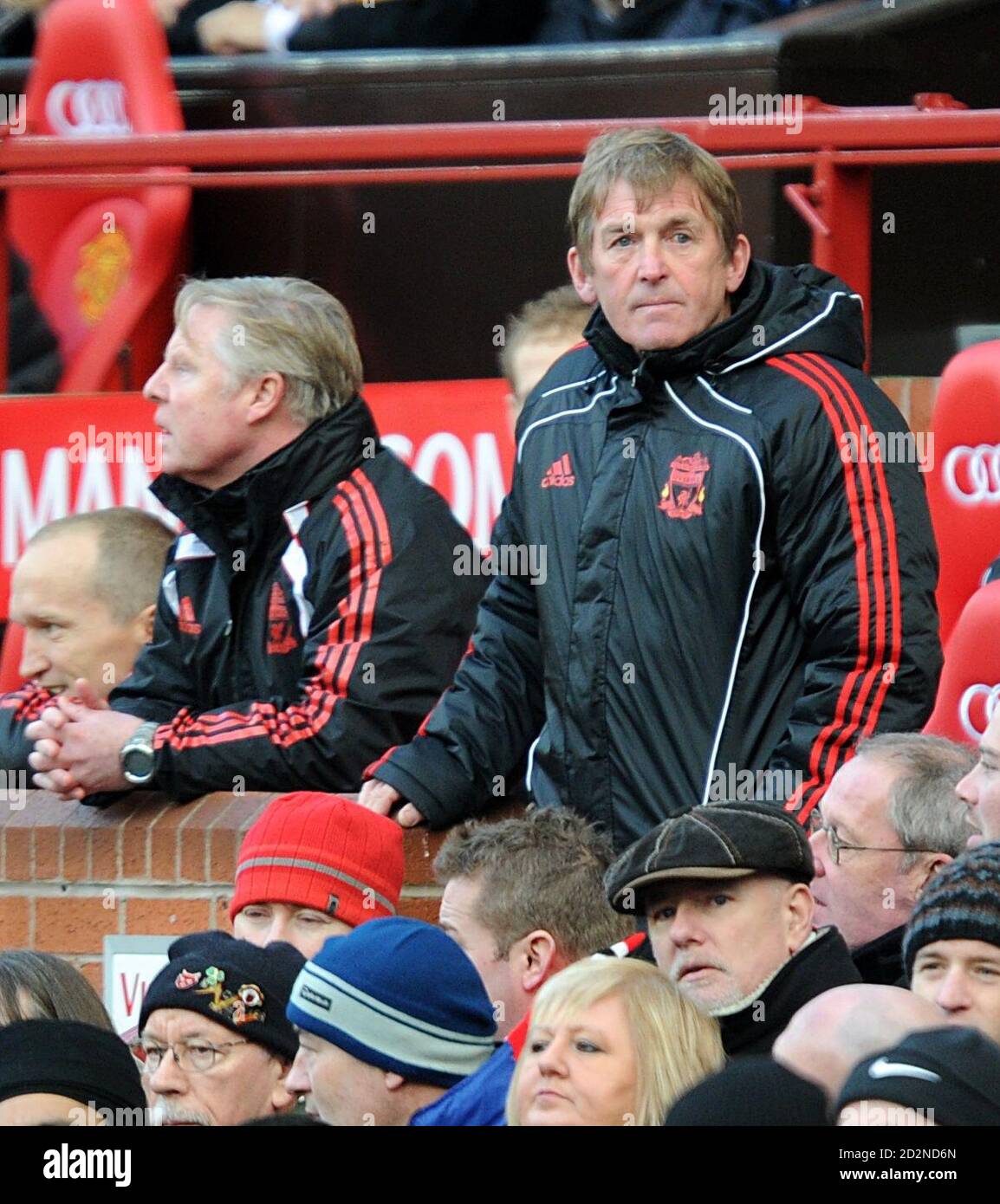 Liverpool manager Kenny Dalglish (right) shows his dejection from the ...