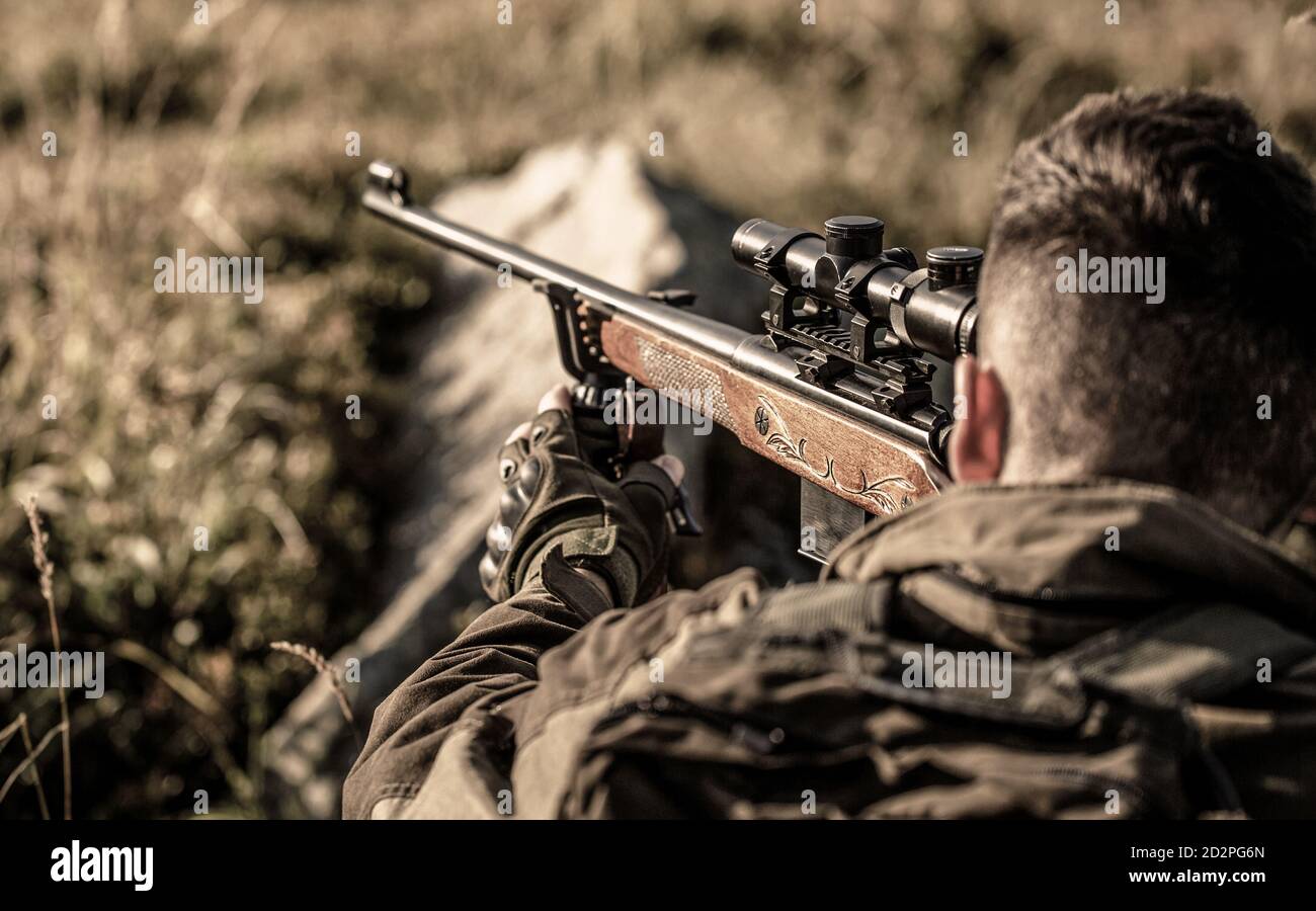 The man is on the hunt. Hunt hunting rifle. Hunter man. Hunter with ...