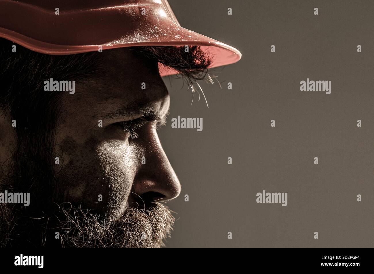 Bearded man worker with beard in building helmet or hard hat. Portrait ...