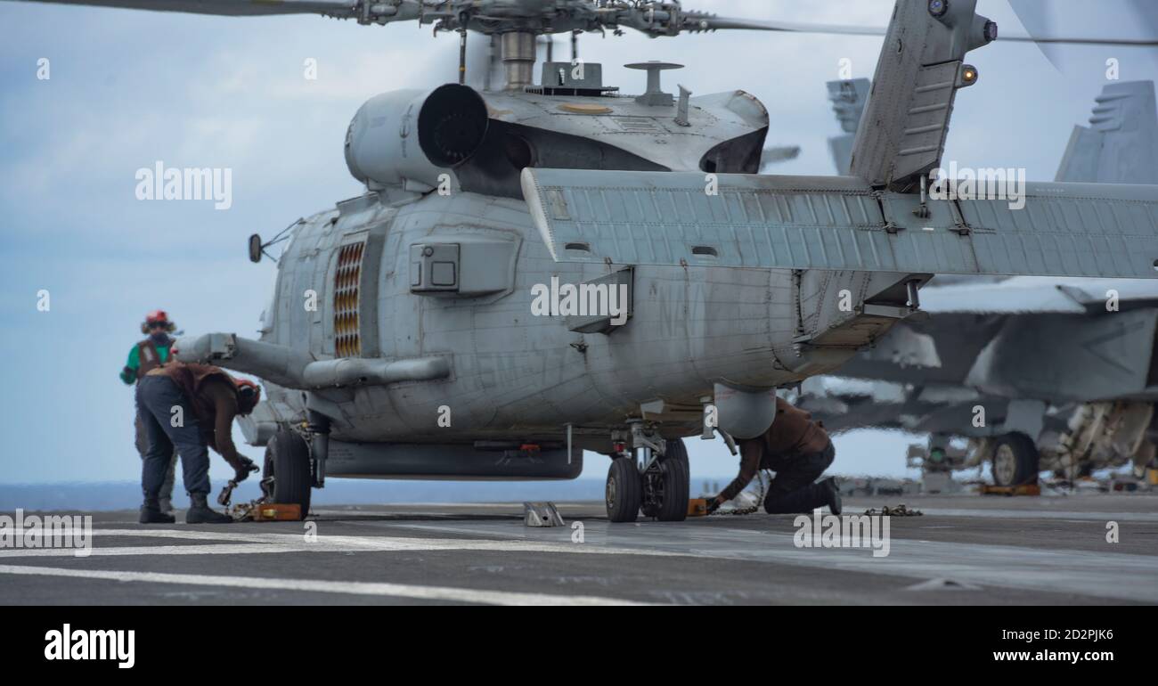 Sailors assigned to the Saberhawks of Helicopter Maritime Strike ...