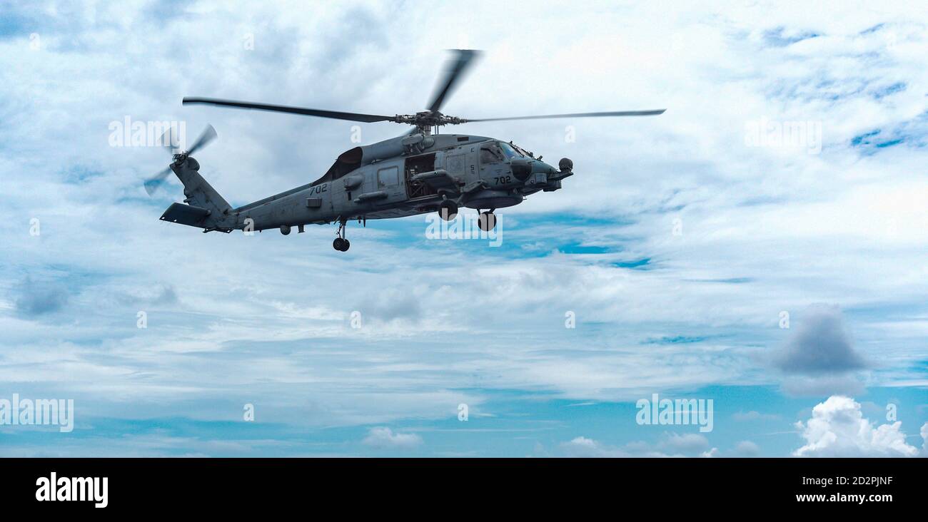 An MH-60R Sea Hawk attached to the Saberhawks of Helicopter Maritime ...