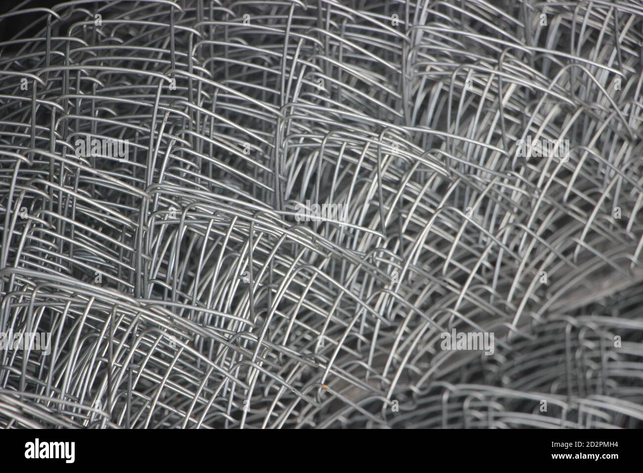 Metal mesh rabitz netting rolled into rolls and coils of steel wire ...