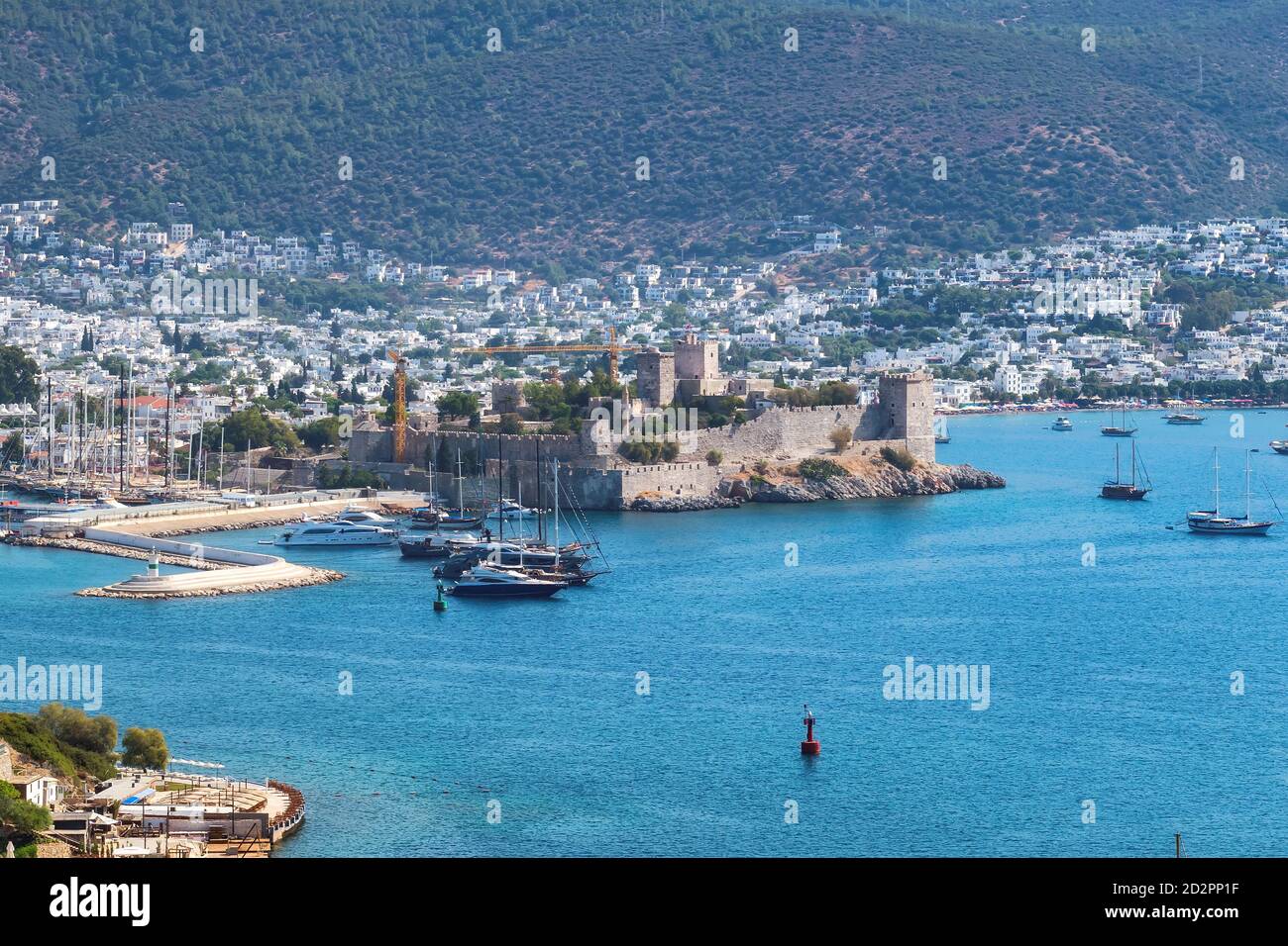 Bodrum Castle and Marina with sailboats and luxury yachts in harbor on ...