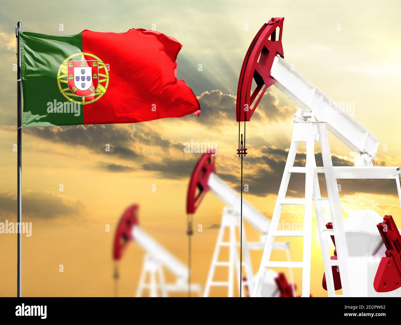 Oil rigs against the backdrop of the colorful sky and a flagpole with ...