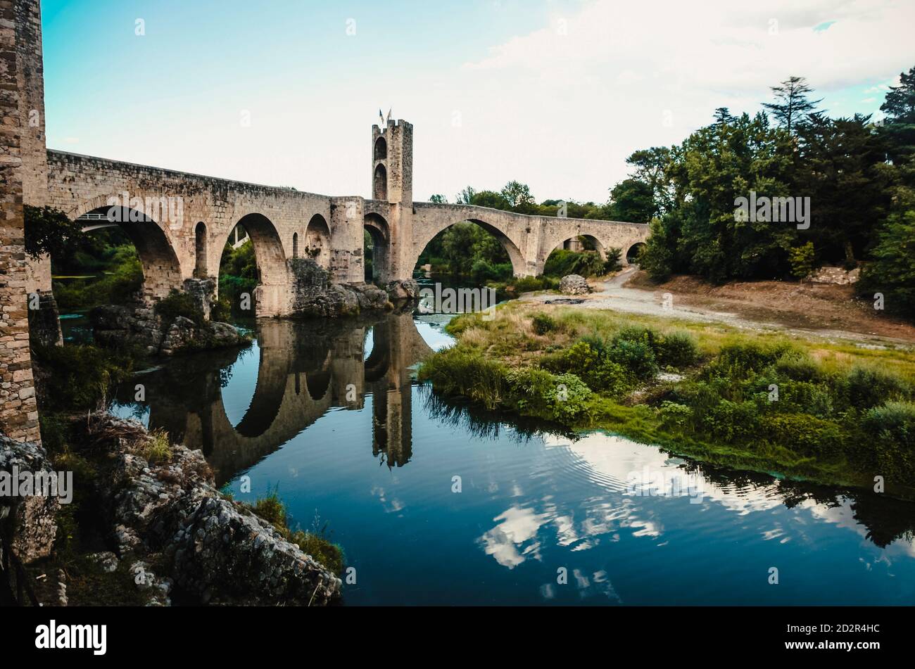 The bridge over the Fluvia river in medieval Besalu town. Catalonia ...