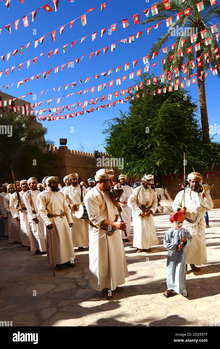 Traditional Omani sword dance in Nizwa fort, Oman Stock Photo - Alamy