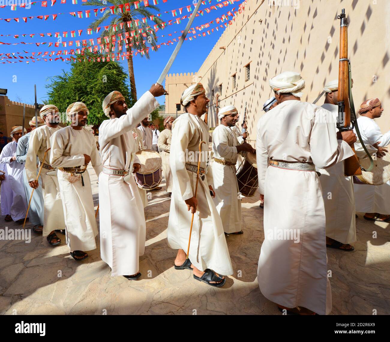 Traditional Omani sword dance in Nizwa fort, Oman Stock Photo - Alamy