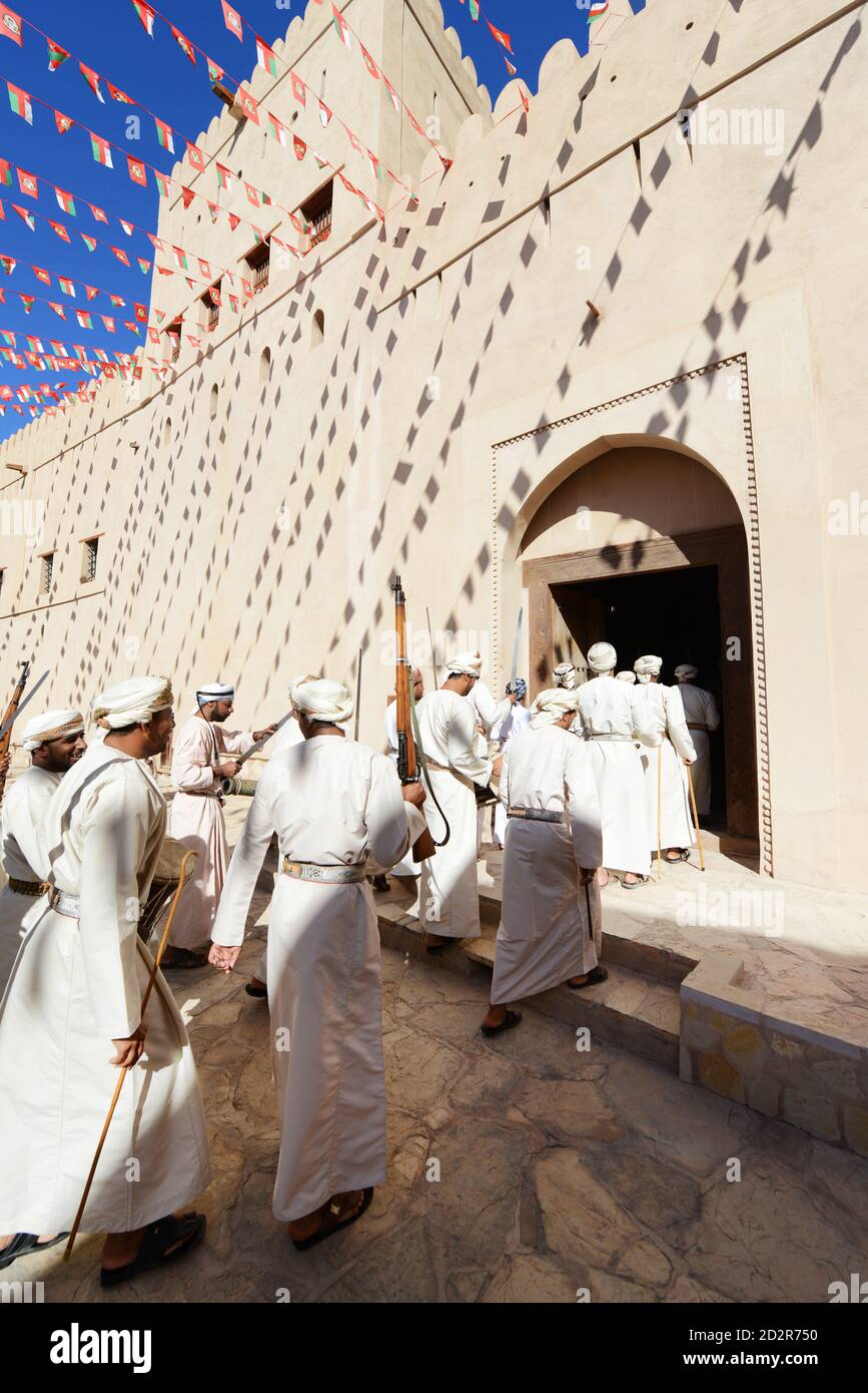 Traditional Omani sword dance in Nizwa fort, Oman Stock Photo - Alamy