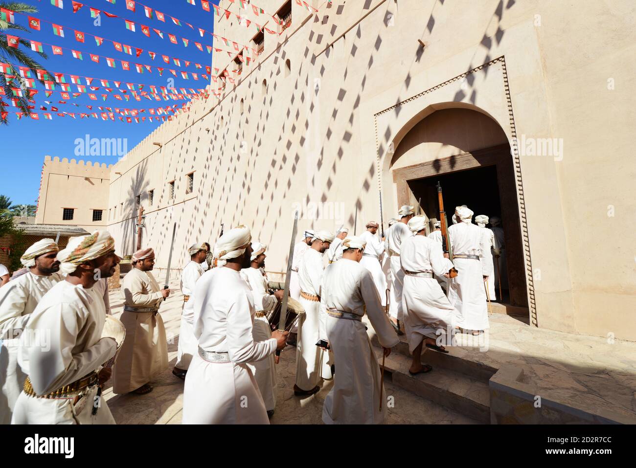 Traditional Omani sword dance in Nizwa fort, Oman Stock Photo - Alamy