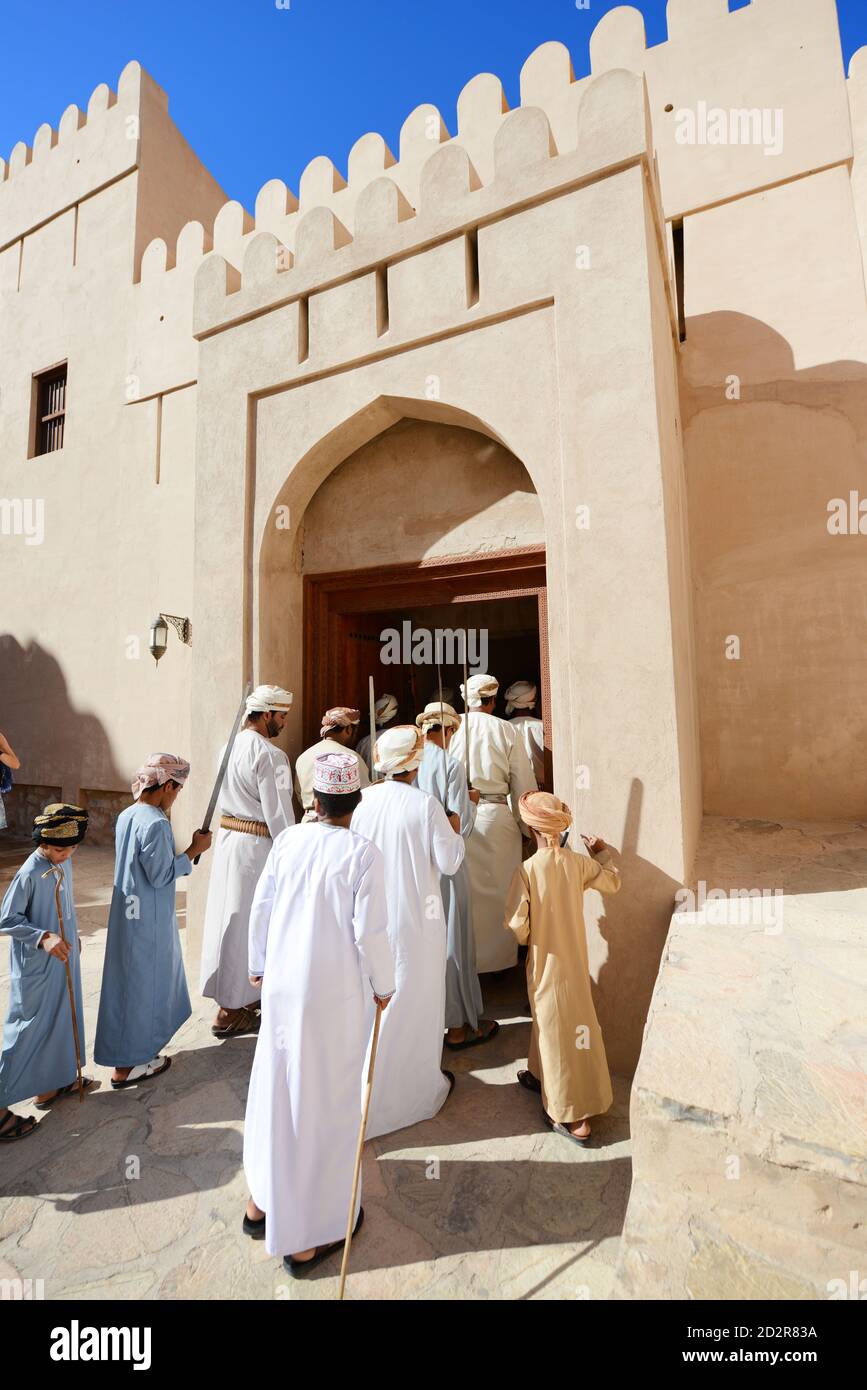 Traditional Omani sword dance in Nizwa fort, Oman Stock Photo - Alamy
