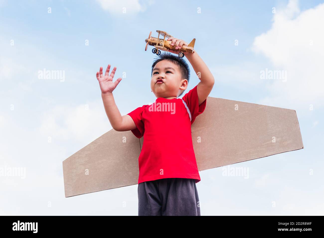 Happy Asian funny child or kid little boy smile wear pilot hat play and ...