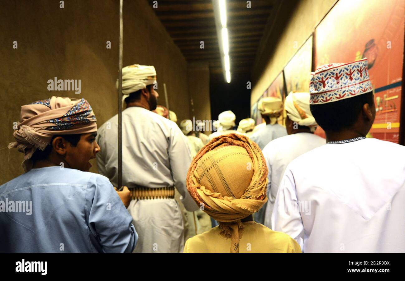Traditional Omani sword dance in Nizwa fort, Oman Stock Photo - Alamy