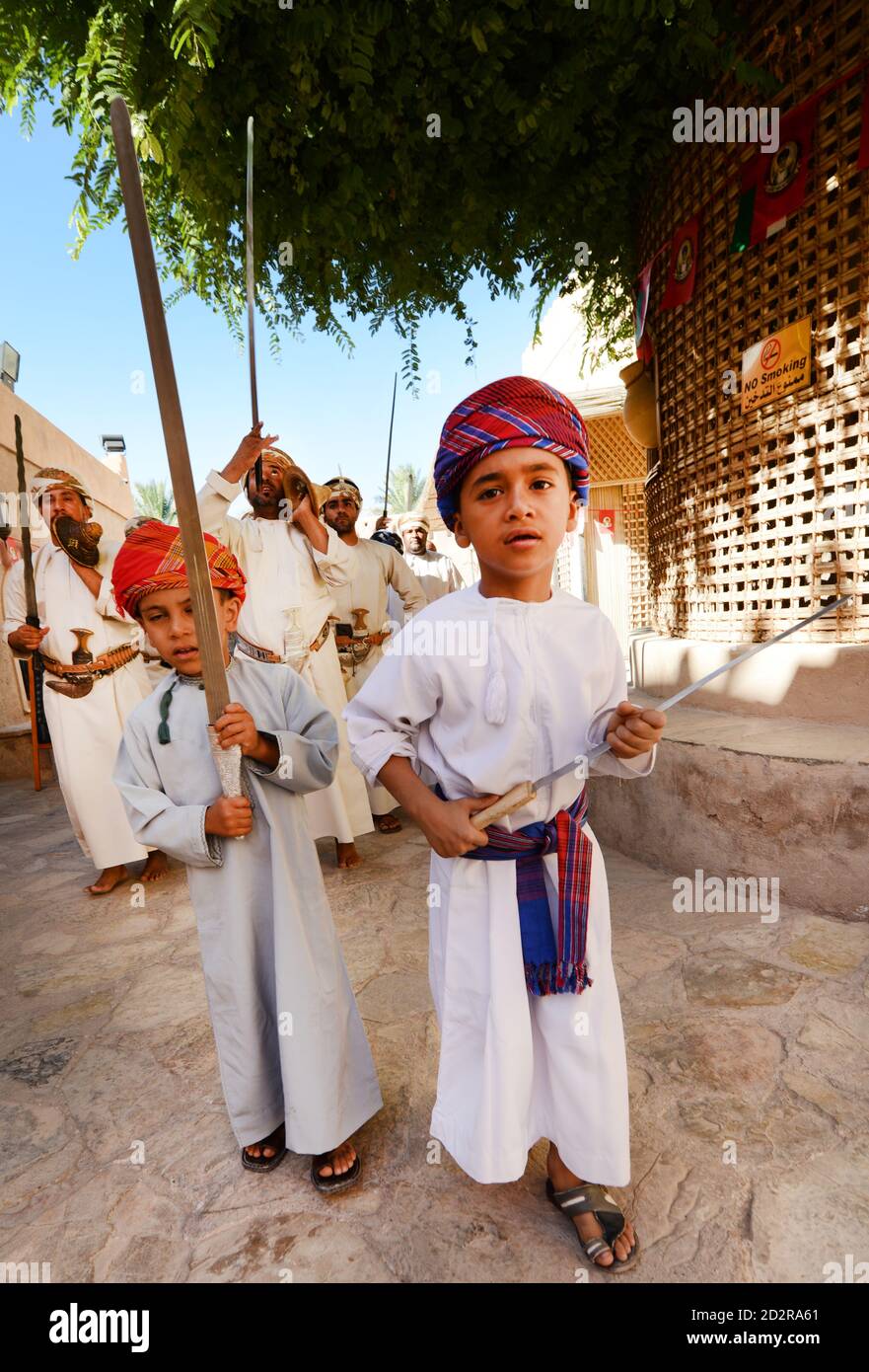 Traditional Omani sword dance in Nizwa fort, Oman Stock Photo - Alamy