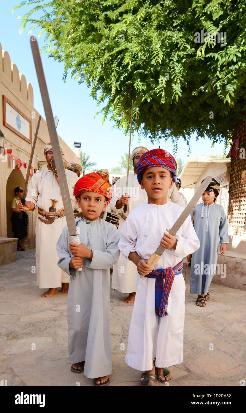 Traditional Omani sword dance in Nizwa fort, Oman Stock Photo - Alamy