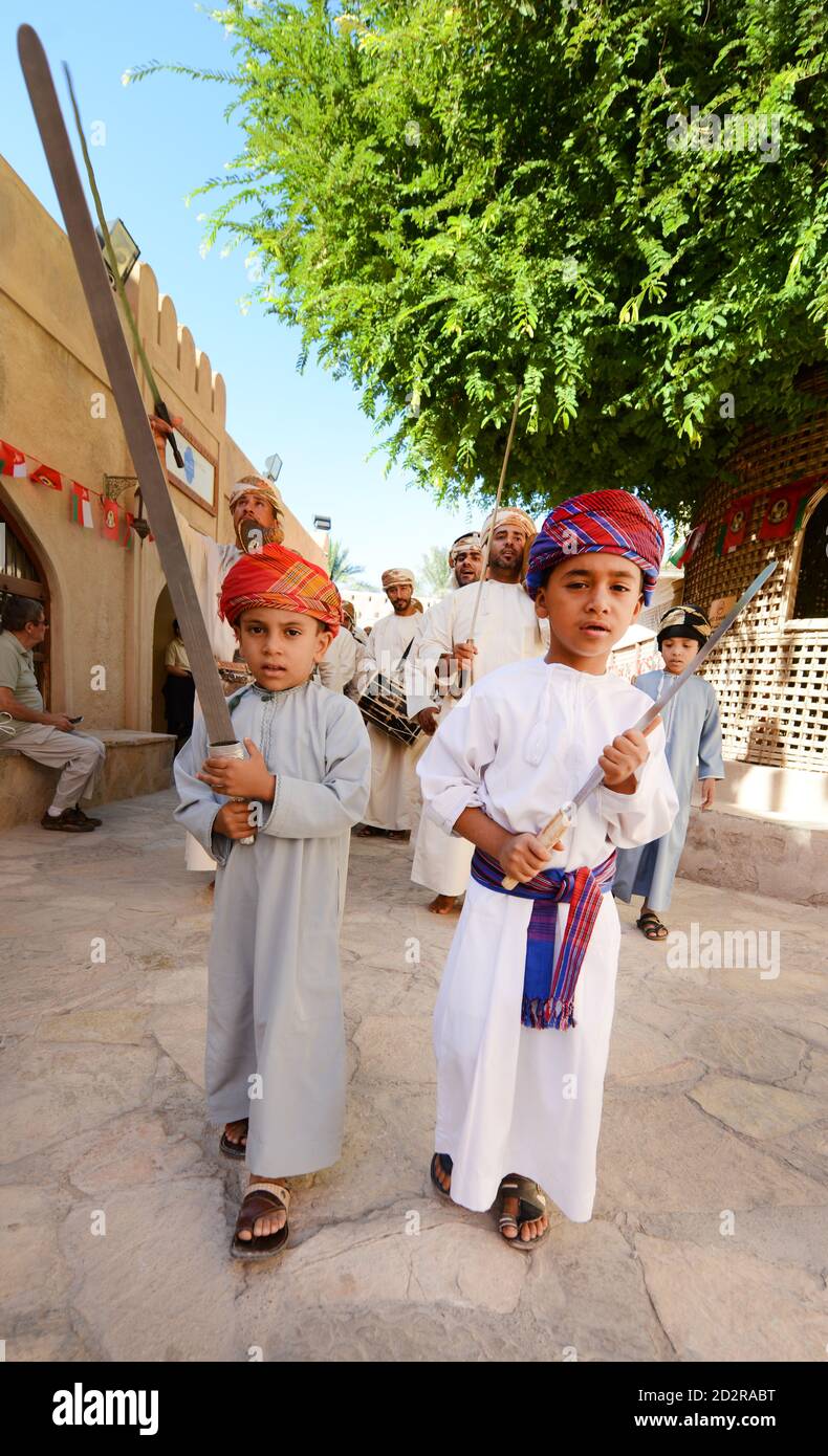 Traditional Omani sword dance in Nizwa fort, Oman Stock Photo - Alamy